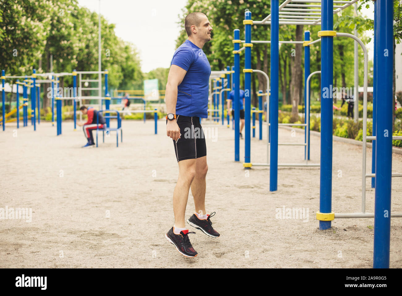 Man jump muscles outdoors hi-res stock photography and images - Alamy
