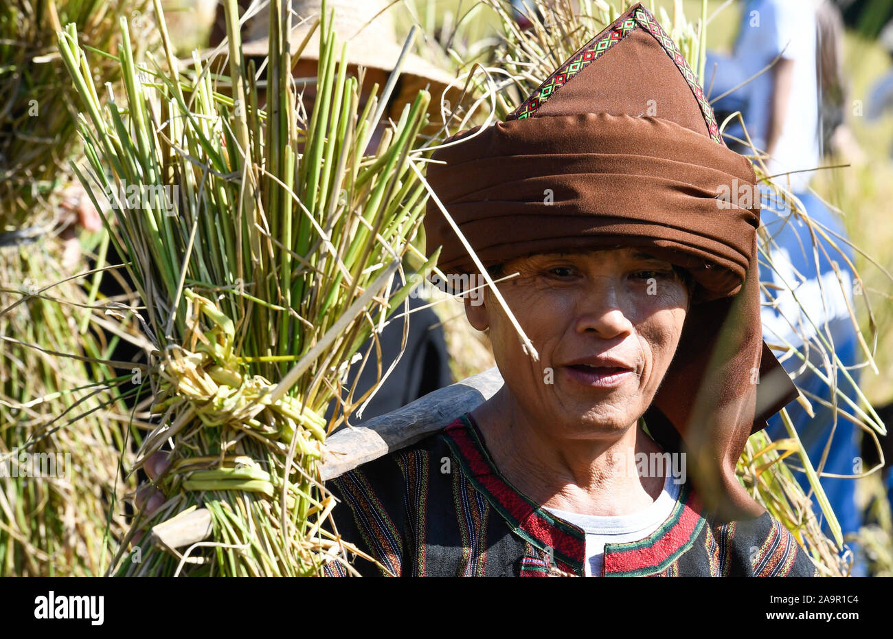 Baisha, China's Hainan Province. 17th Nov, 2019. A villager goes back ...