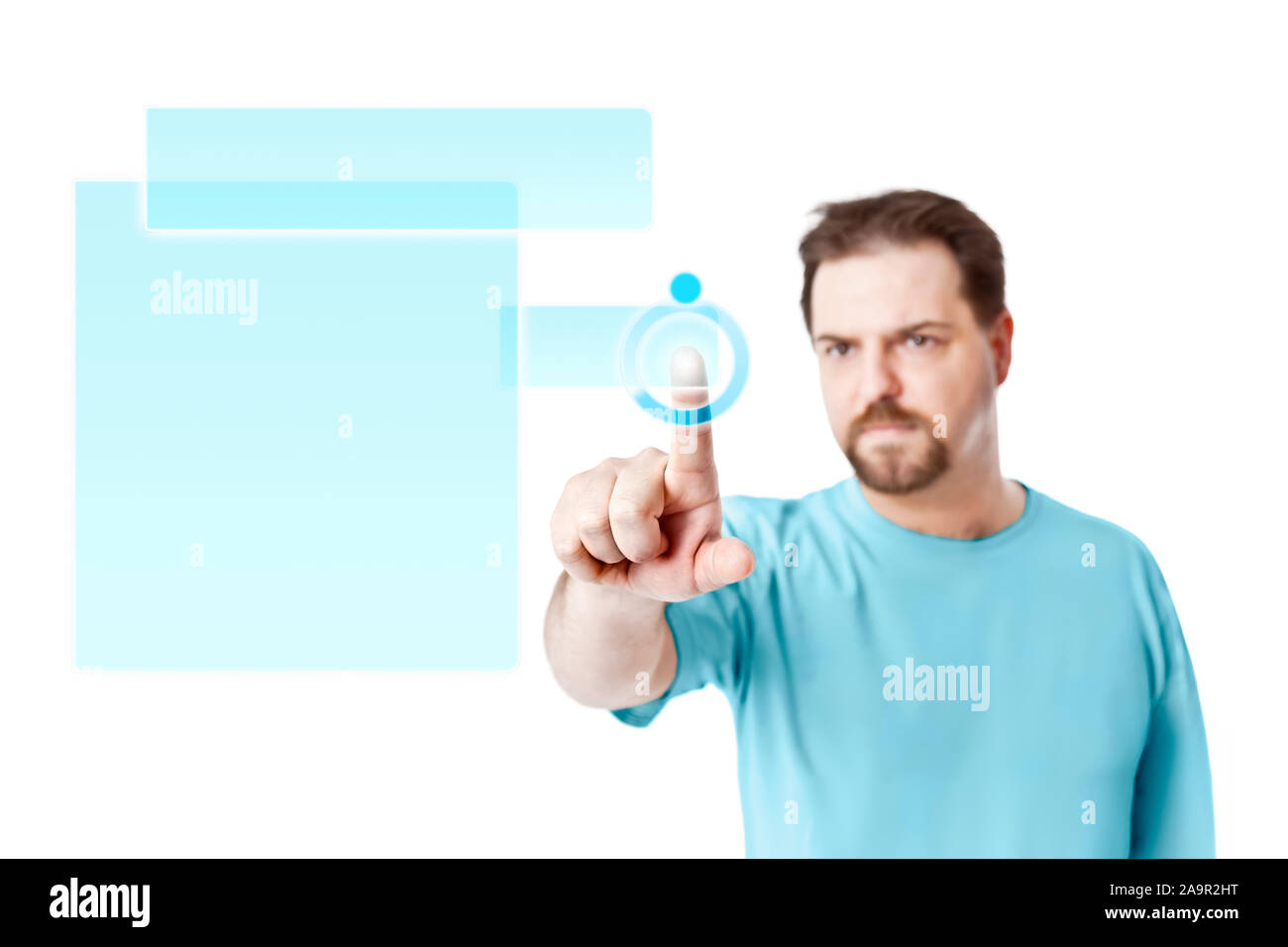 A handsome young man touching a virtual screen, Modelrelease Stock ...