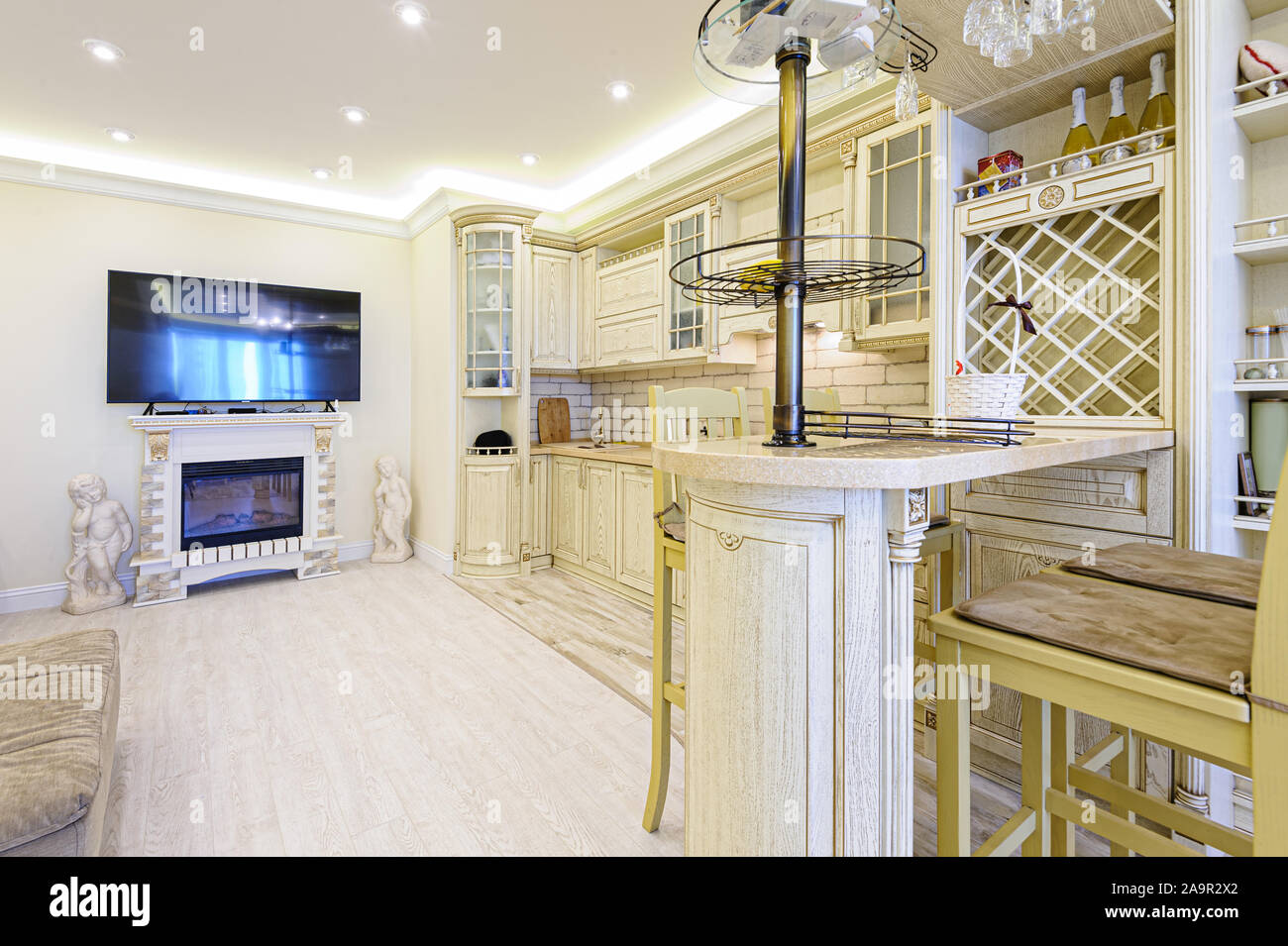 Luxury modern beige kitchen interior Stock Photo - Alamy