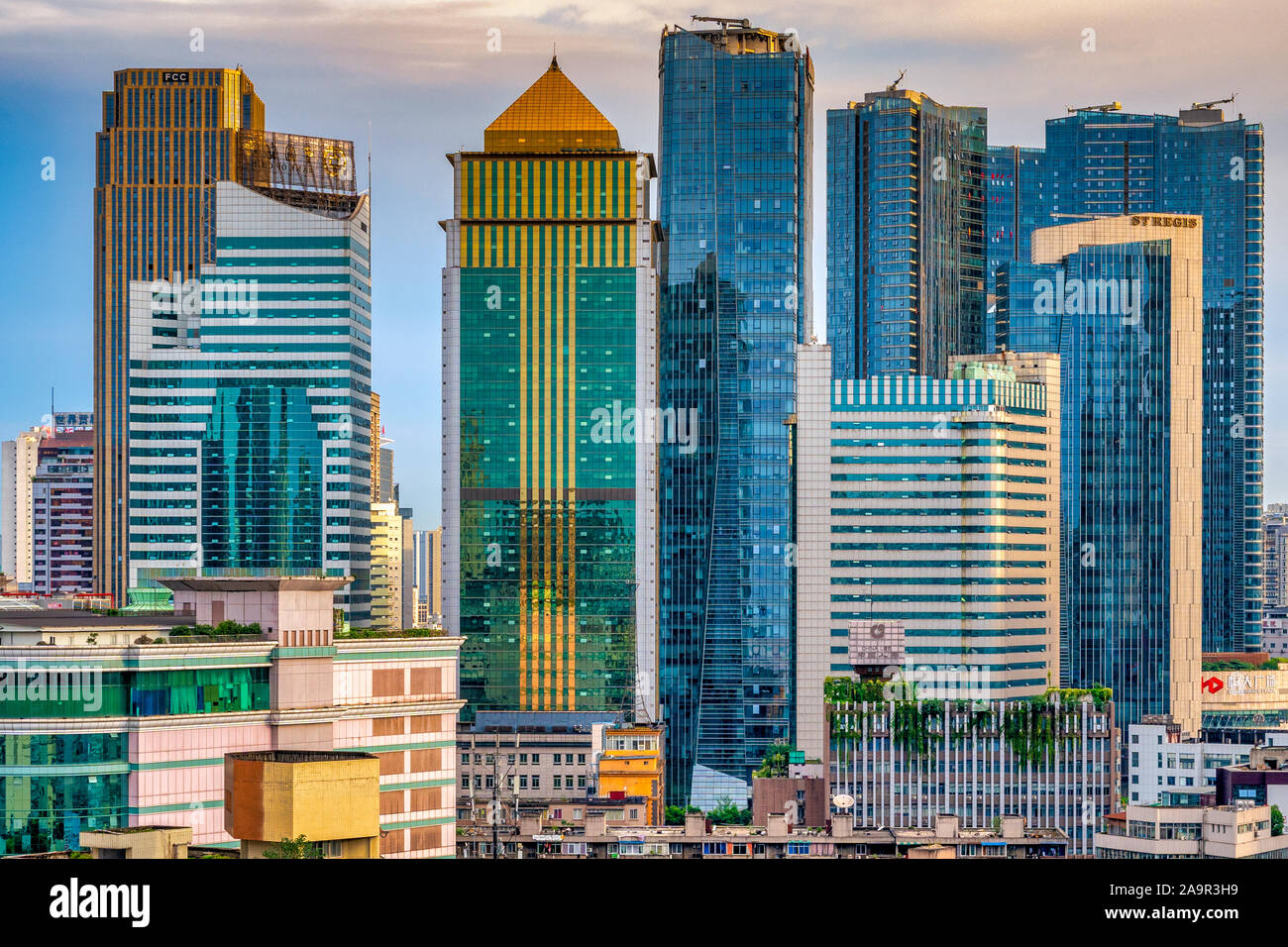 Glass and metal facades of modern buildings and architecture in Sichuan ...