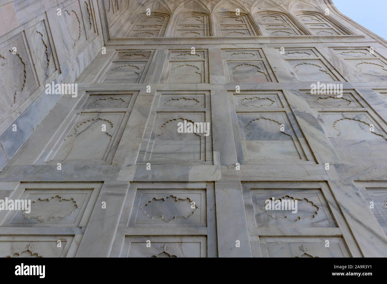 Decorated archway wall of the entrance of the Taj Mahal. Taj Mahal is ...