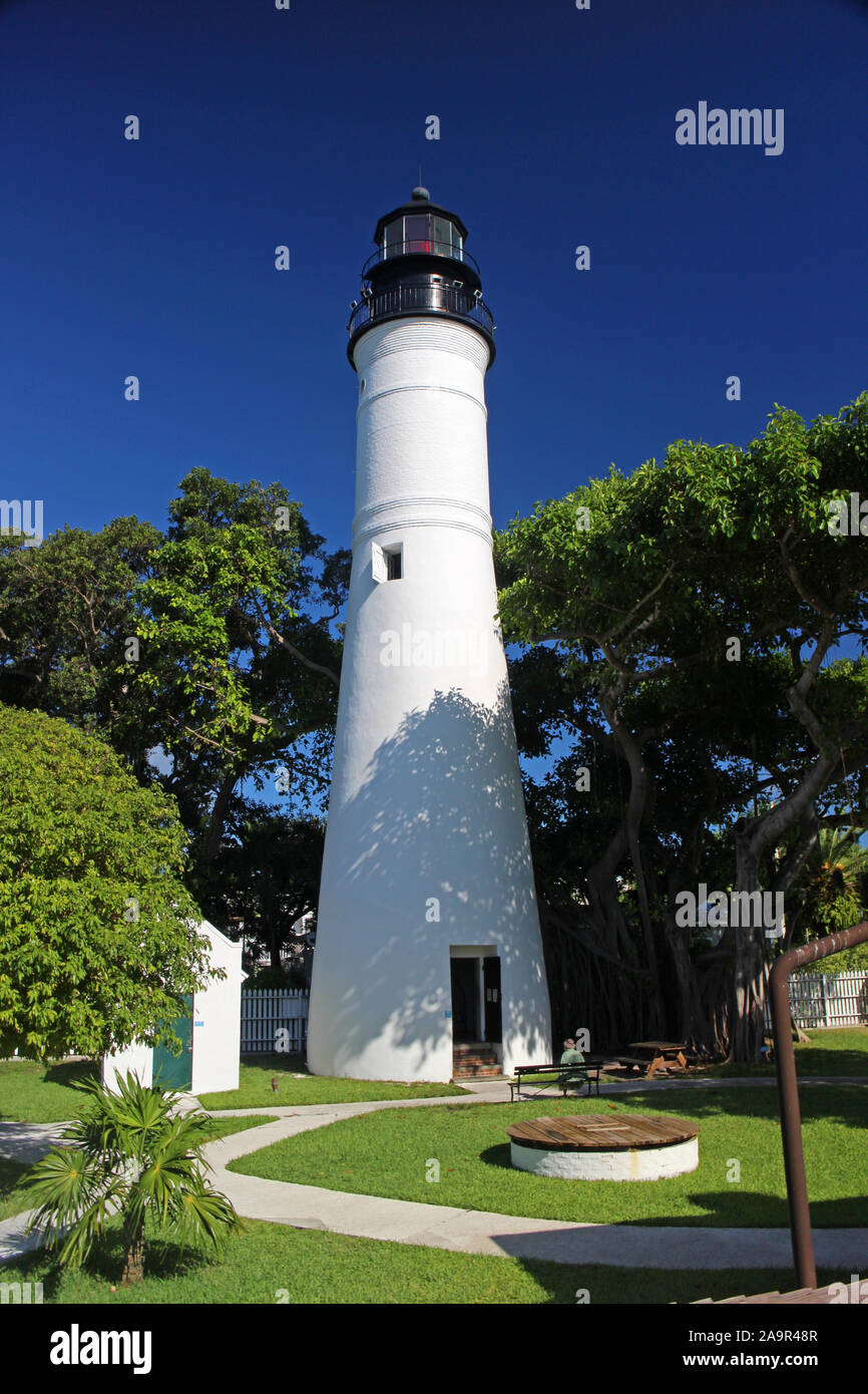 Female mannequin sitting on bench outside Key West Lighthouse Stock ...