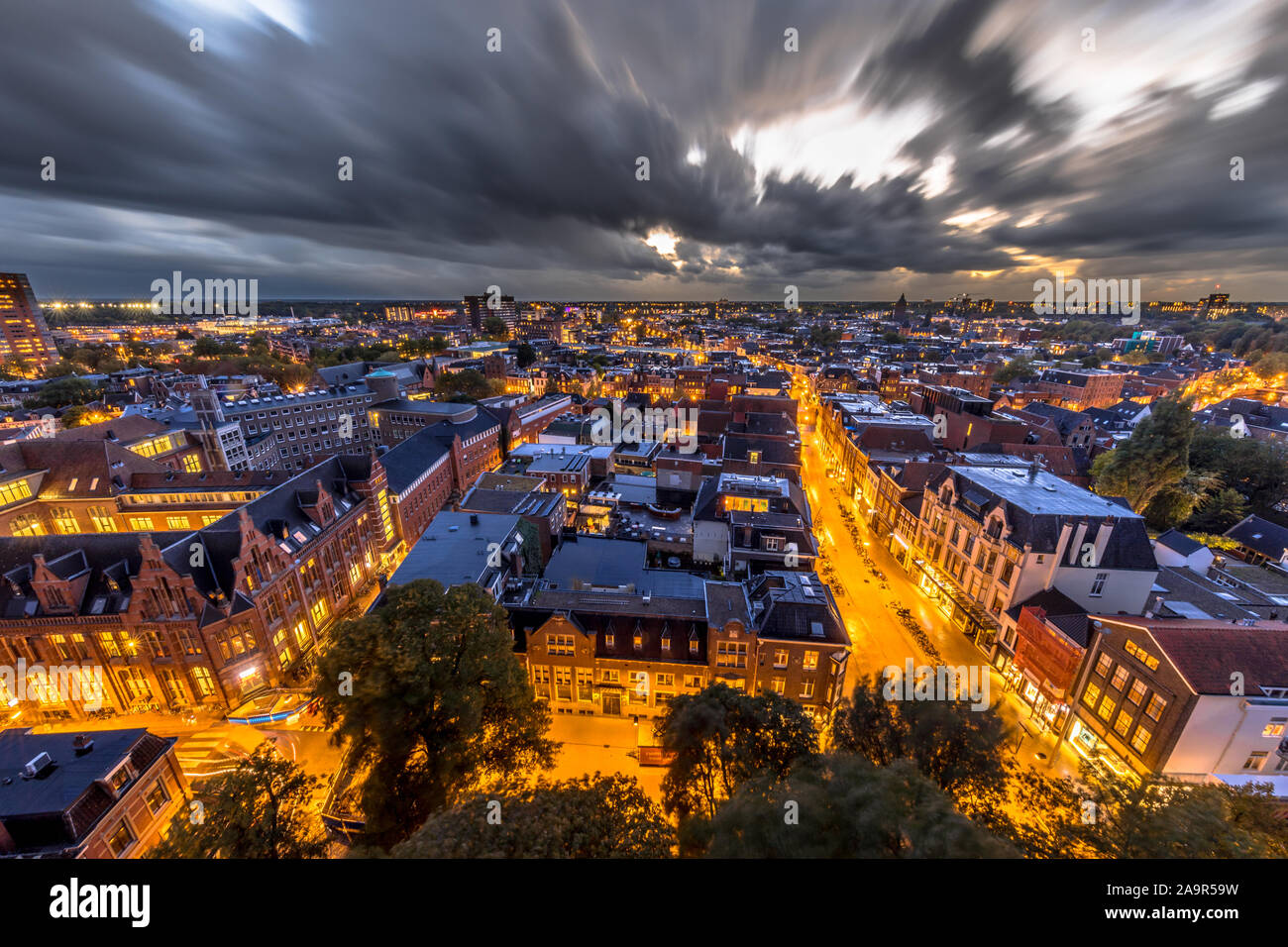 Aerial view of historic town centre of Groningen city at night. The ...