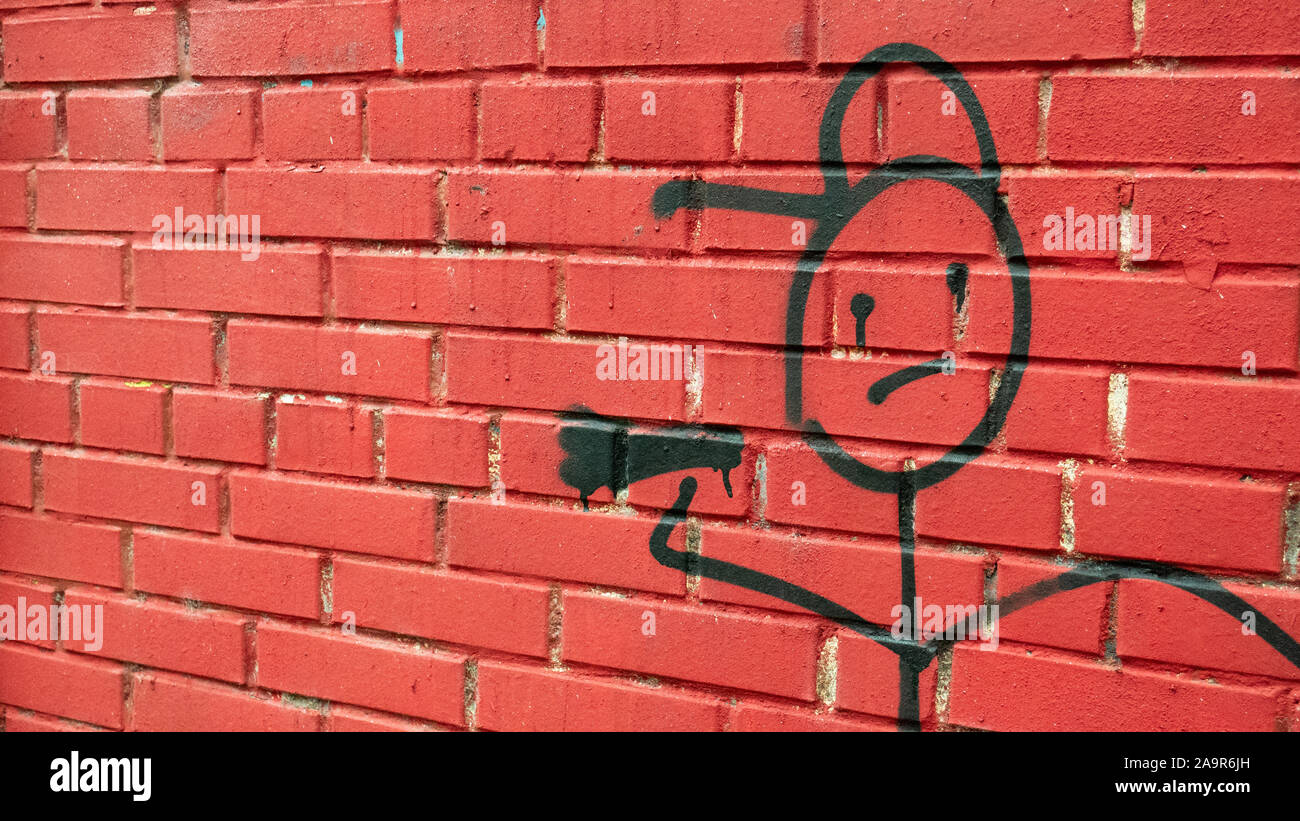 The figure of a drawn man holding a megaphone Stock Photo - Alamy