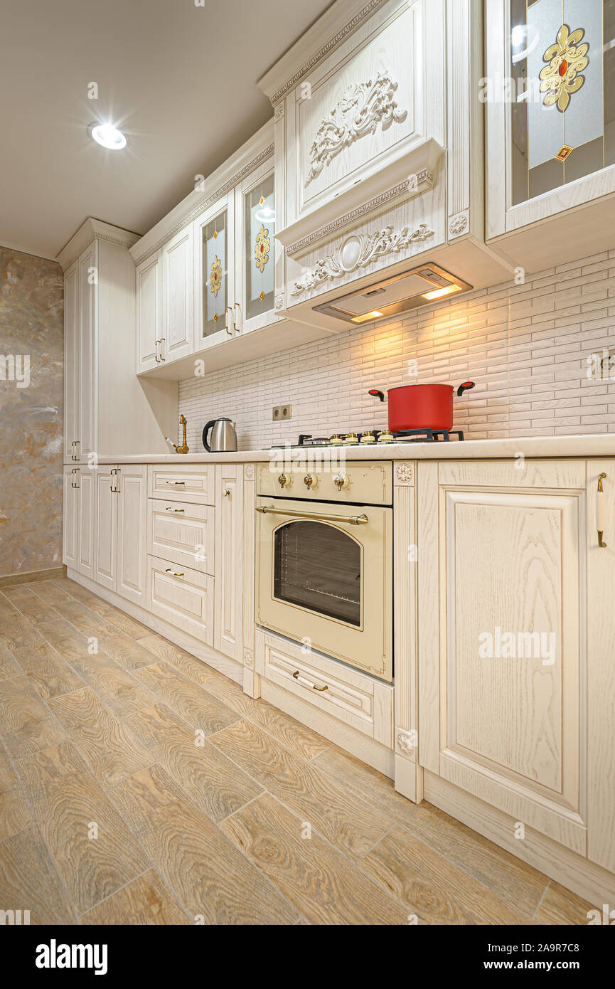 Luxury modern white and beige kitchen interior Stock Photo - Alamy