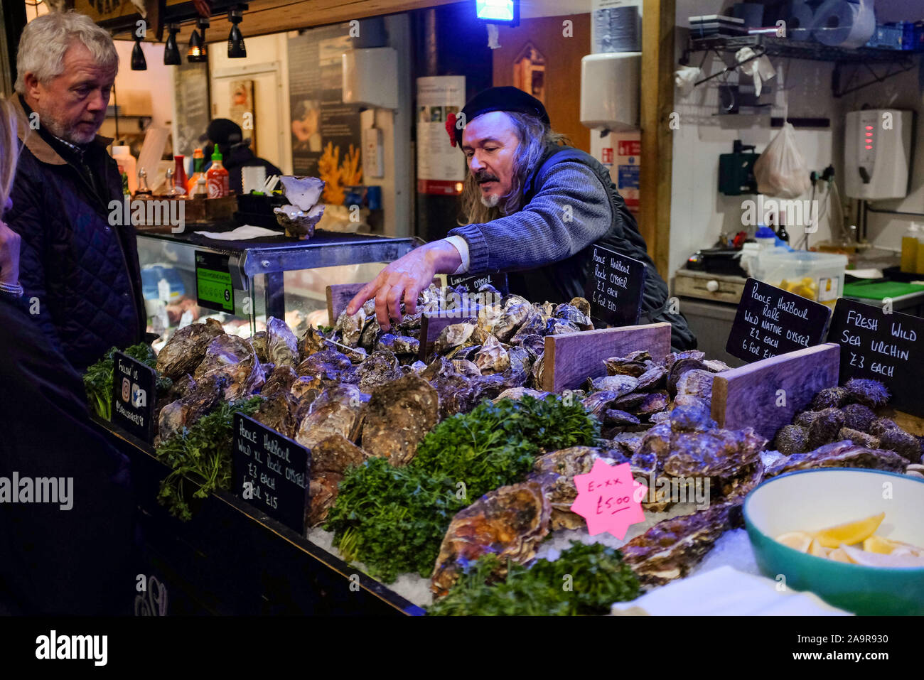 Borough Market in London UK - Stall with oysters and shellfish at ...