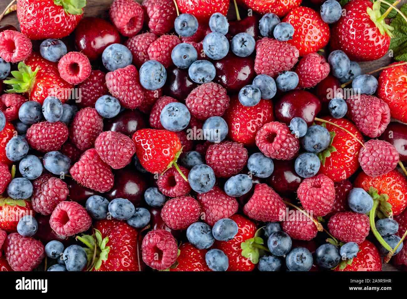 Berries closeup colorful assorted mix of strawberry, blueberry ...