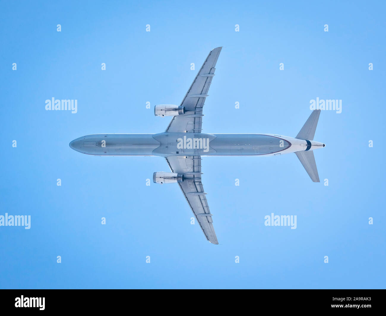 Clear blue sky and silver plane hi-res stock photography and images - Alamy