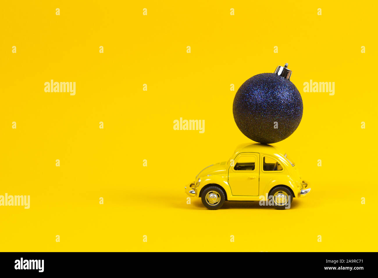 Vilnius, Lithuania - November 15, 2019: Yellow retro toy model car with ...