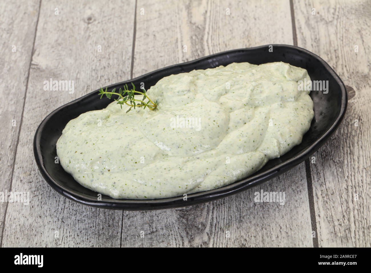 Cottage cream snack with herbs and garlic Stock Photo - Alamy