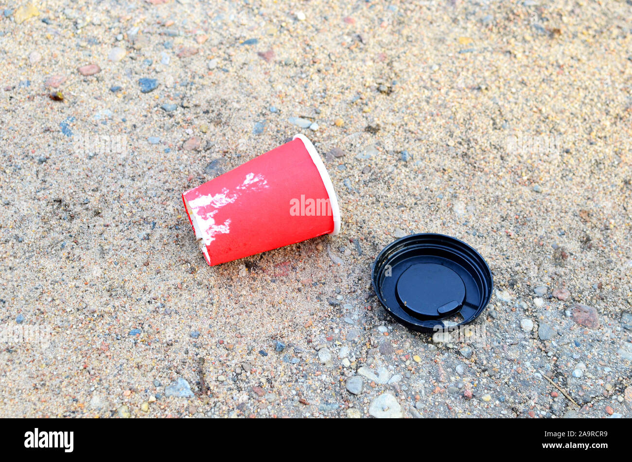 People throw coffee cups to the street. The problem of environmental ...