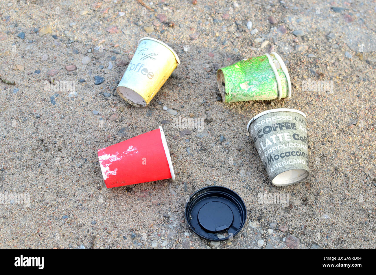 People throw coffee cups to the street. The problem of environmental ...