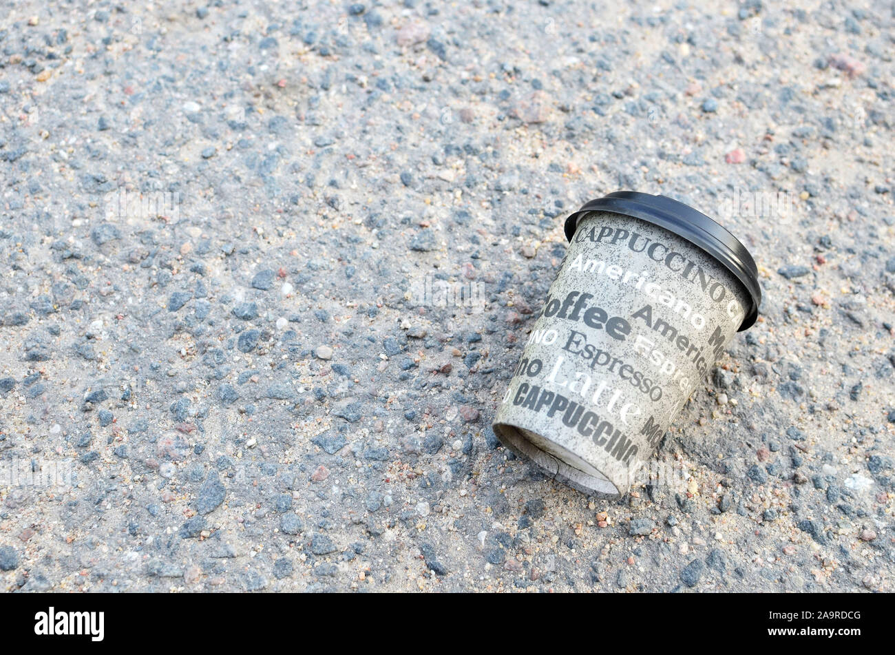 People throw coffee cups to the street. The problem of environmental ...