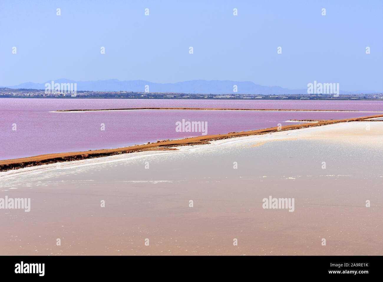 Pink salt lakes at the Torrevieja salt works, Torrevieja, Alicante ...