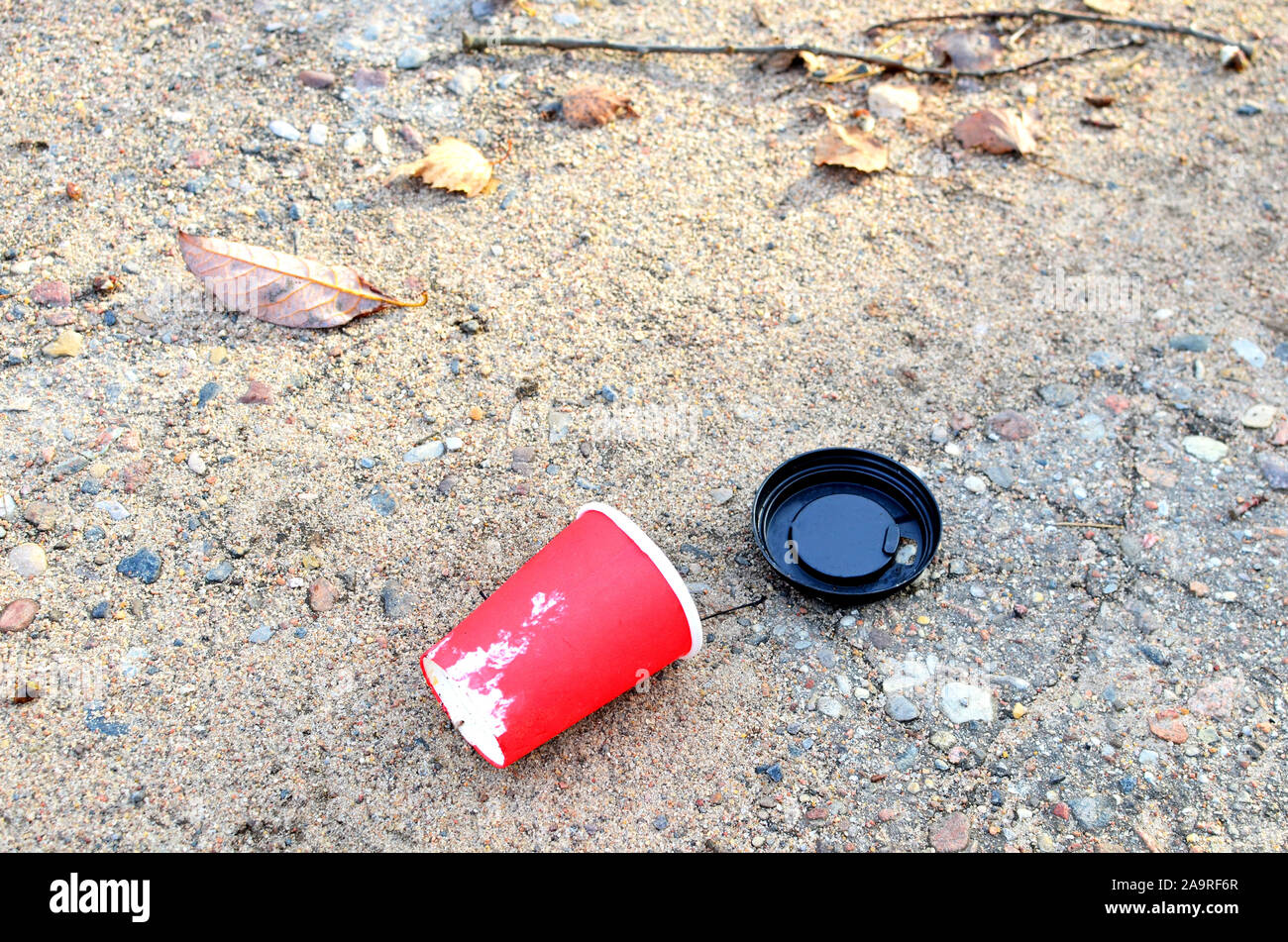 People throw coffee cups to the street. The problem of environmental ...