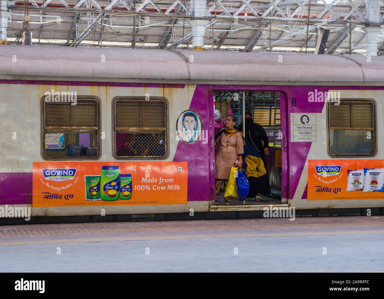 The suburban railway in Mumbai India Stock Photo - Alamy