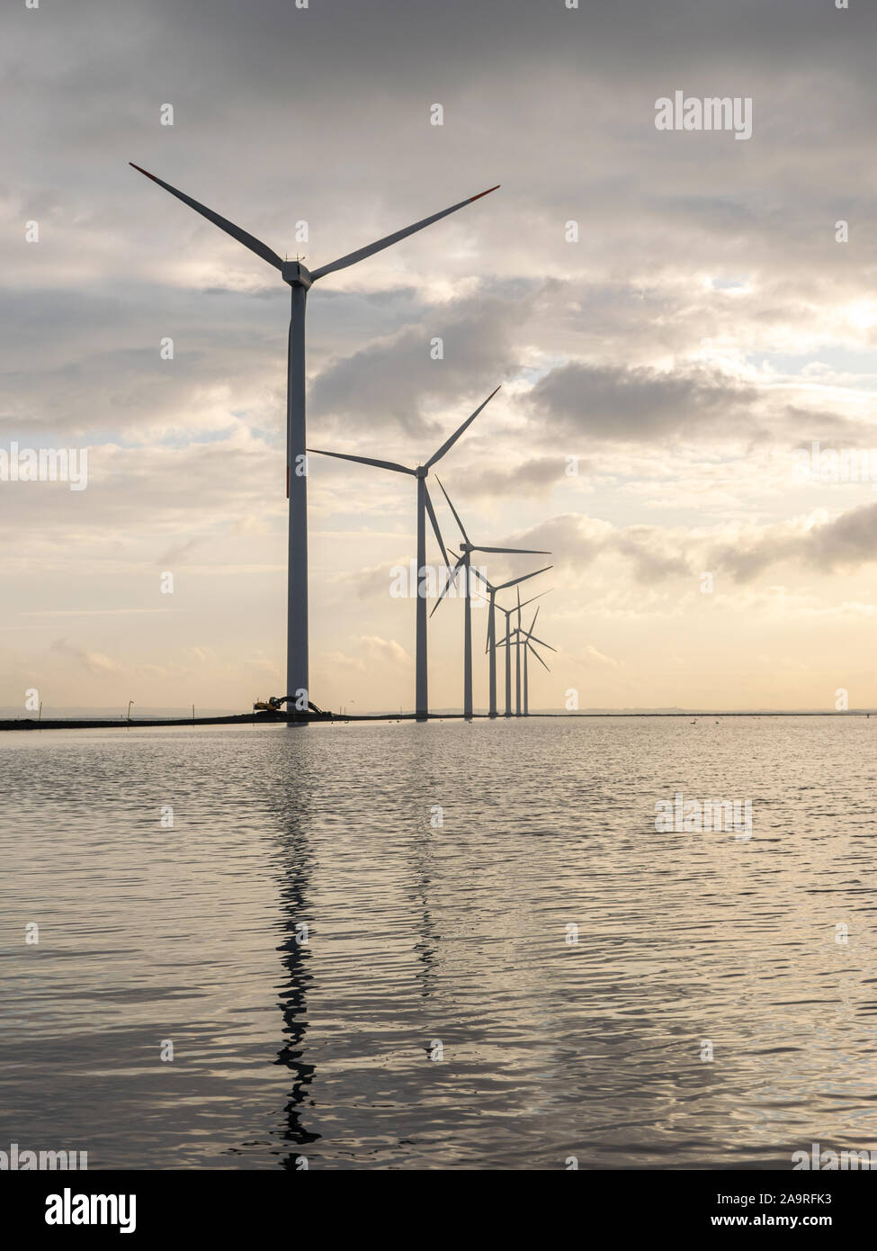 landscape with wind generators in a sea Stock Photo - Alamy