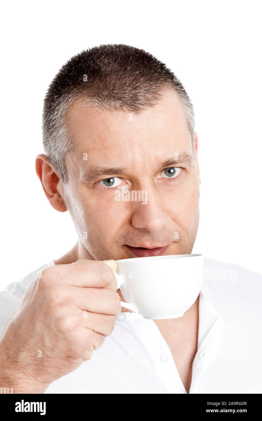A handsome man with a cup of coffee Stock Photo - Alamy