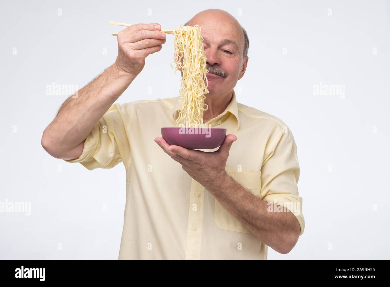 Man eating pasta isolated hi-res stock photography and images - Alamy