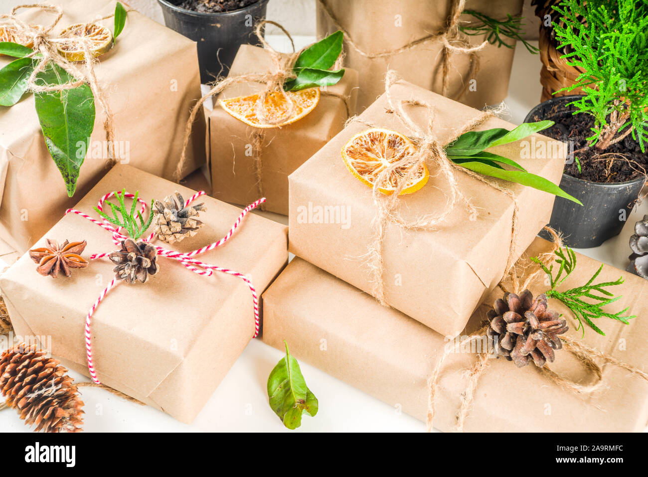 Collection of christmas gift boxes with natural rustic decorations ...