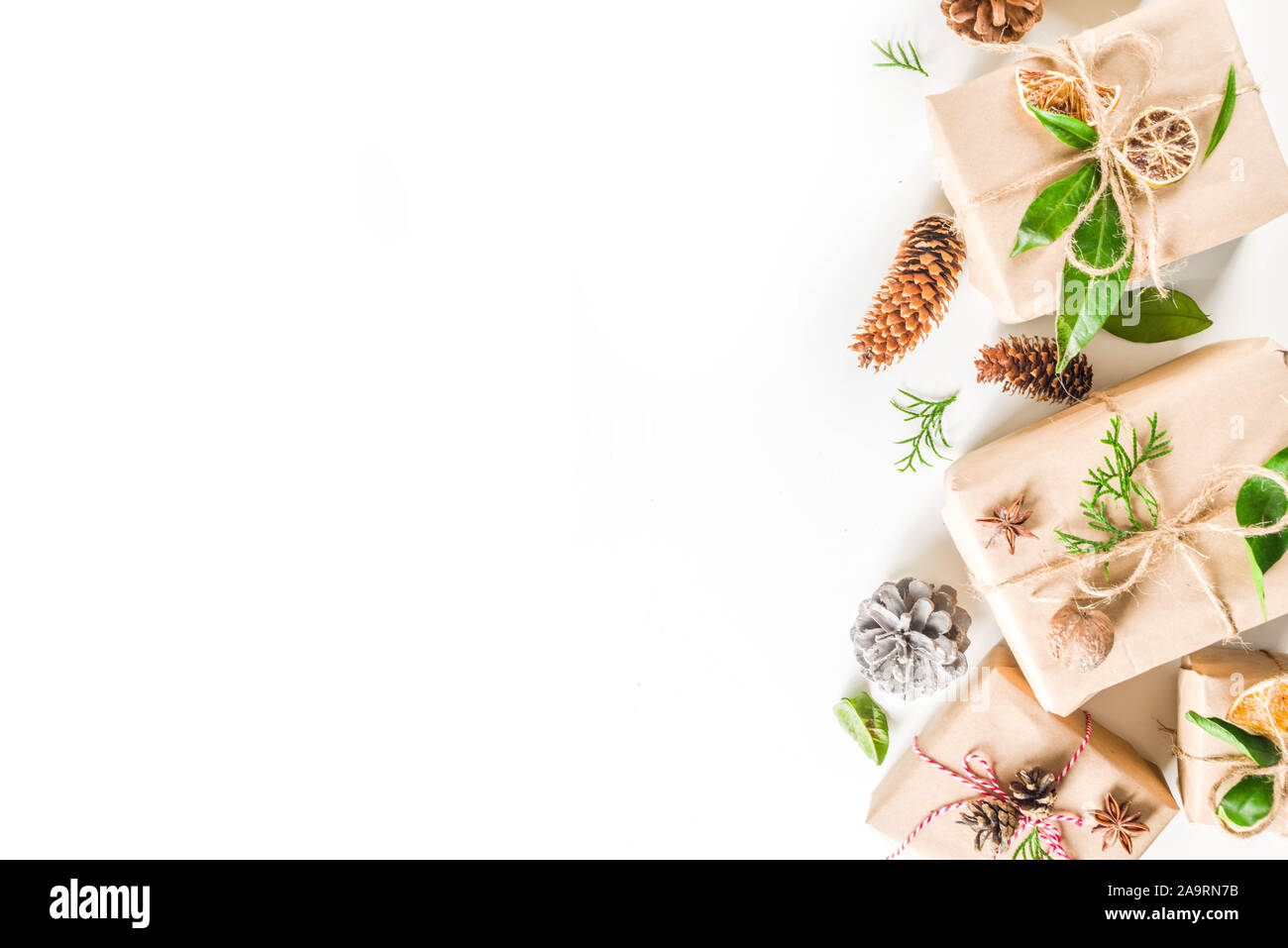 Collection of christmas gift boxes with natural rustic decorations ...