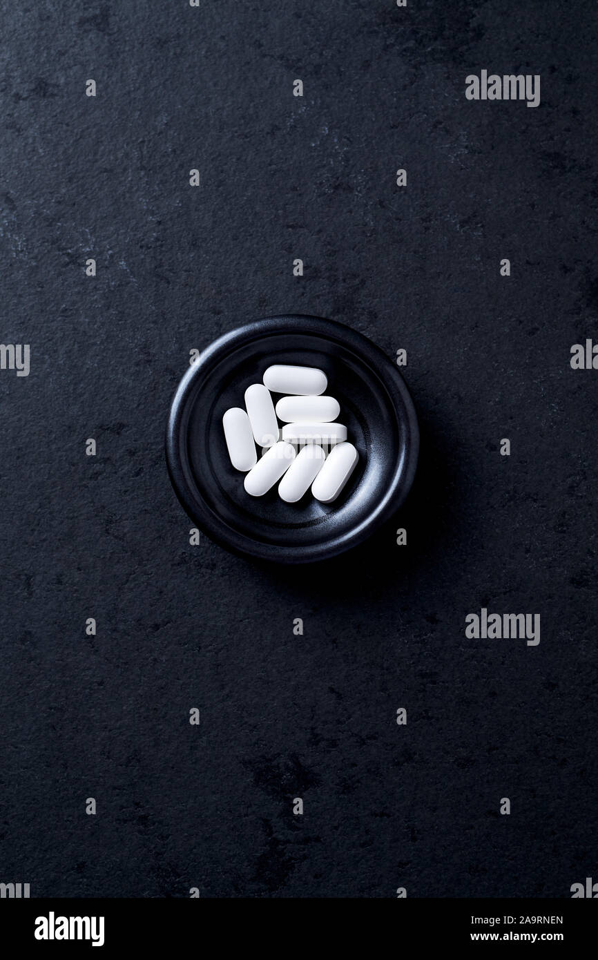 Lysine tablets. Concept for a healthy dietary supplementation Stock ...