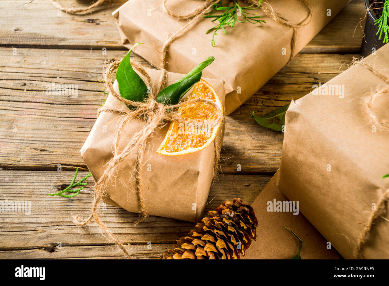 Collection of christmas gift boxes with natural rustic decorations ...