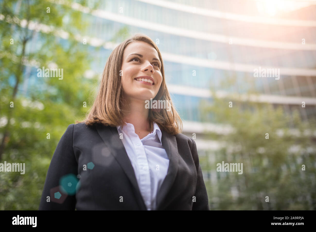 Portrait of a smiling business woman Stock Photo - Alamy