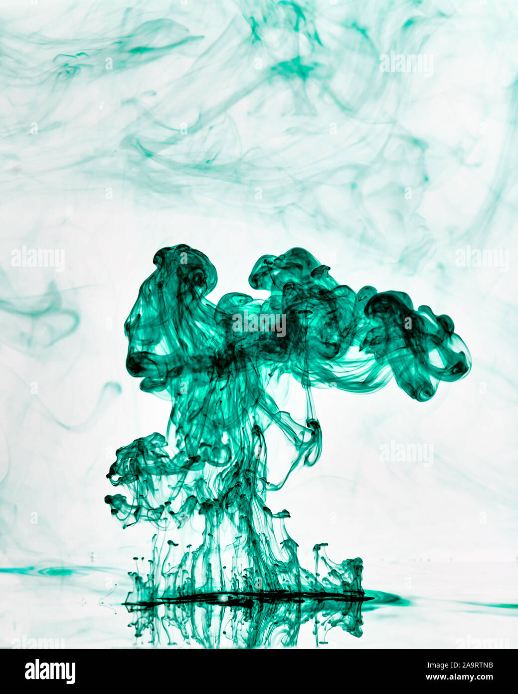 The colorful ink into the water while in motion, Abstract, background ...