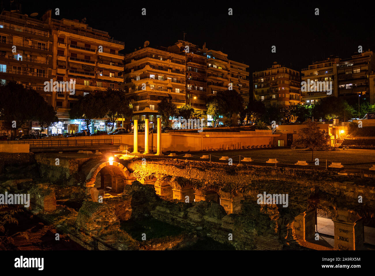Ruins of ancient Greek Agora (later Roman Forum) illuminated at night ...