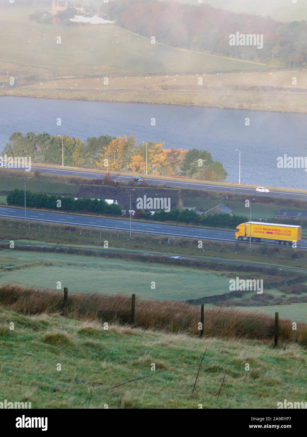 Stott Hall Farm and M62 in the mist fog from B6114 Saddleworth Road ...