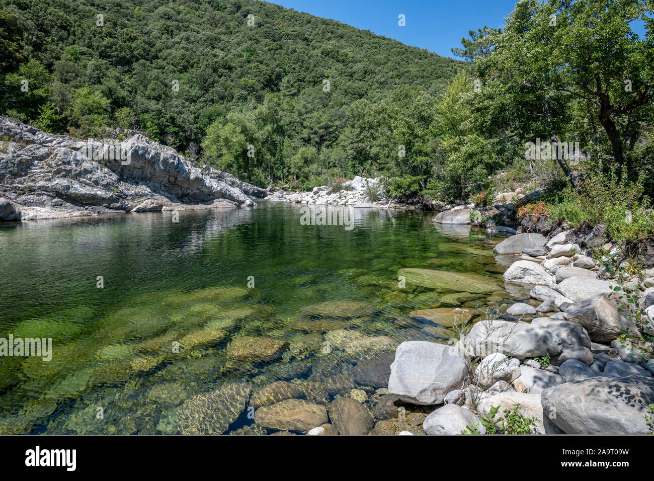 Pure and fresh water natural pool of Travu River, Corsica, France ...