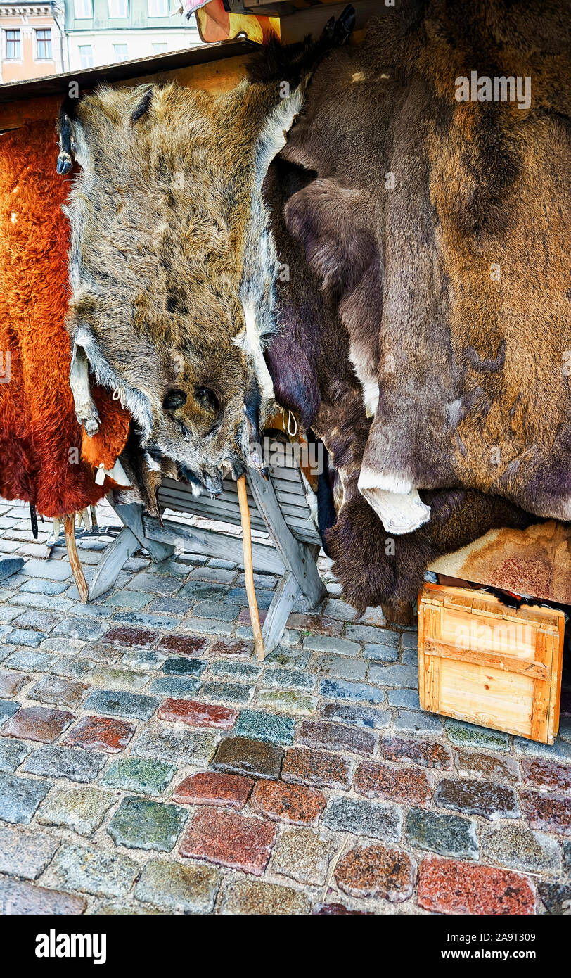 Animal fur on display at the Riga Christmas Market new Stock Photo - Alamy