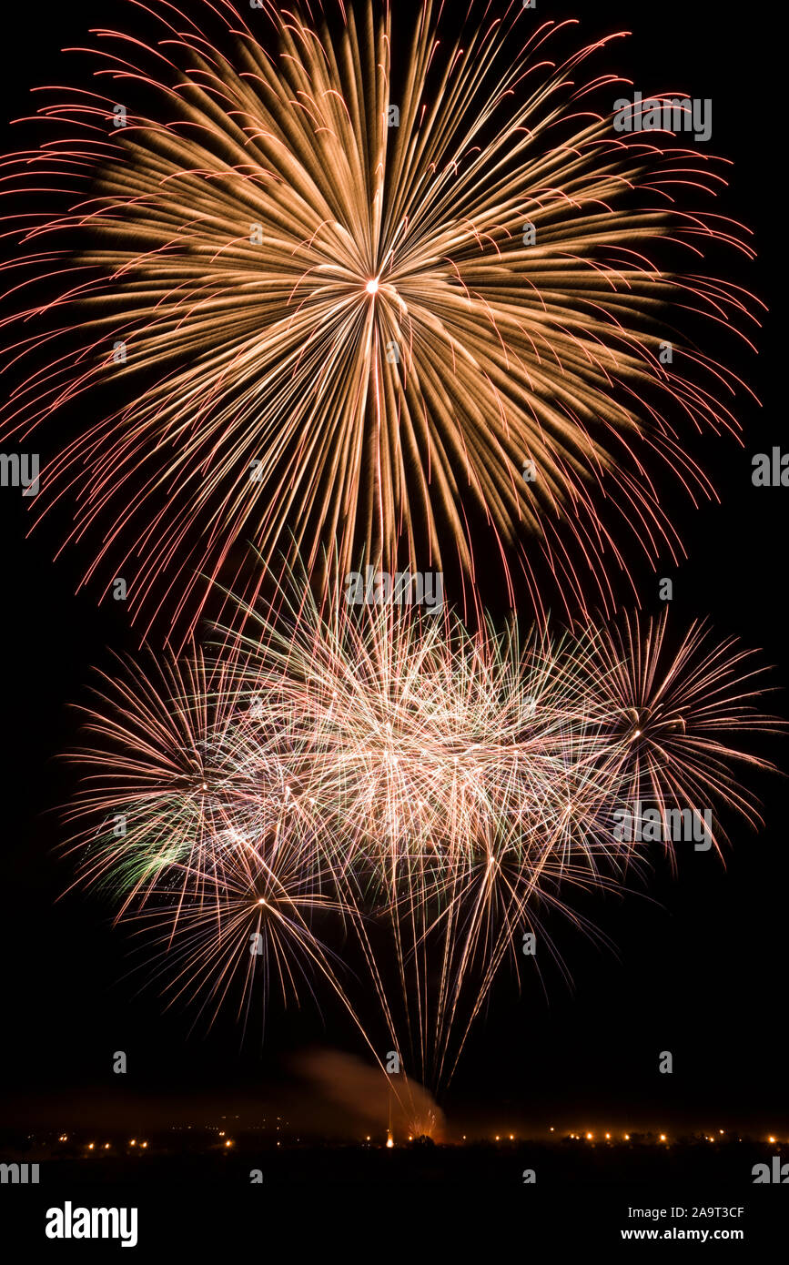 Fireworks exploding in the night sky Stock Photo - Alamy