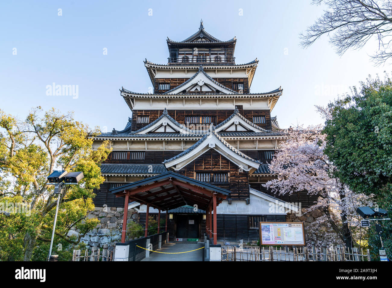 Hiroshima castle in Japan. Springtime with cherry blossoms, the main ...