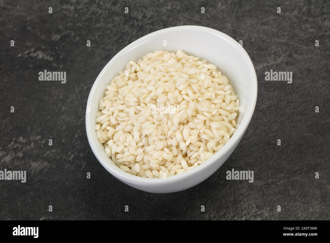 Raw Arborio rice for Italian risotto Stock Photo - Alamy
