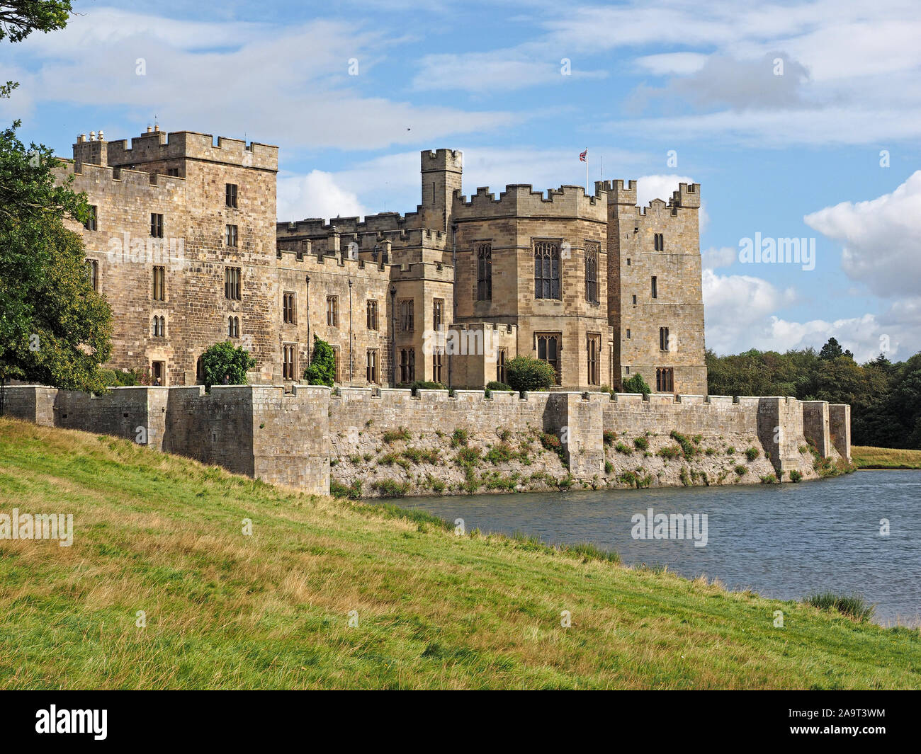landscape view of 14th century Raby Castle across the lake in the ...