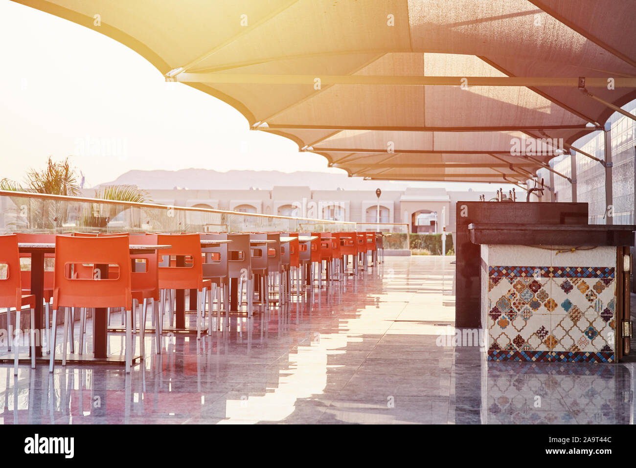 Empty terrace with table and chairs outdoor Stock Photo - Alamy