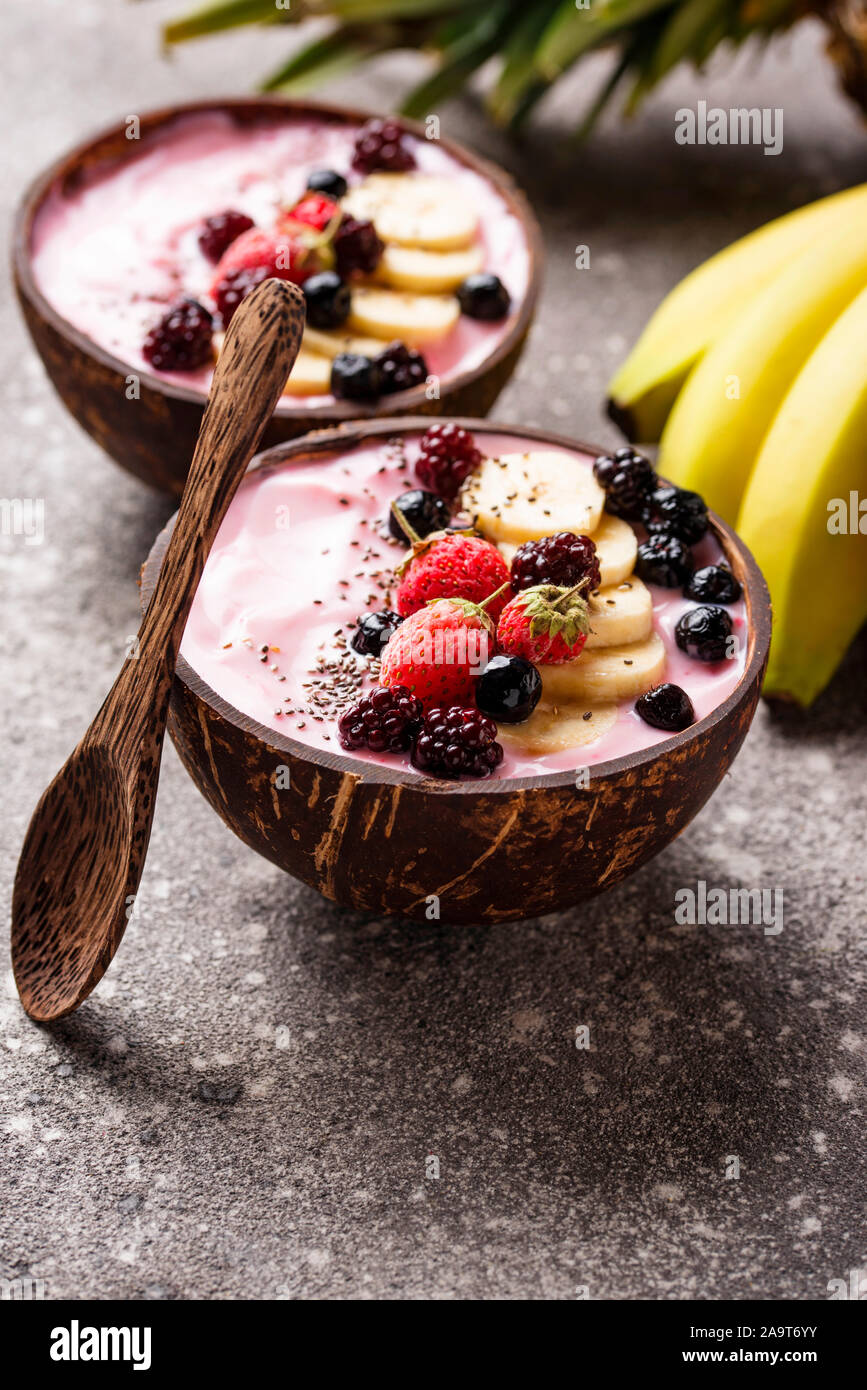 Acai bowl in coconut plate Stock Photo - Alamy