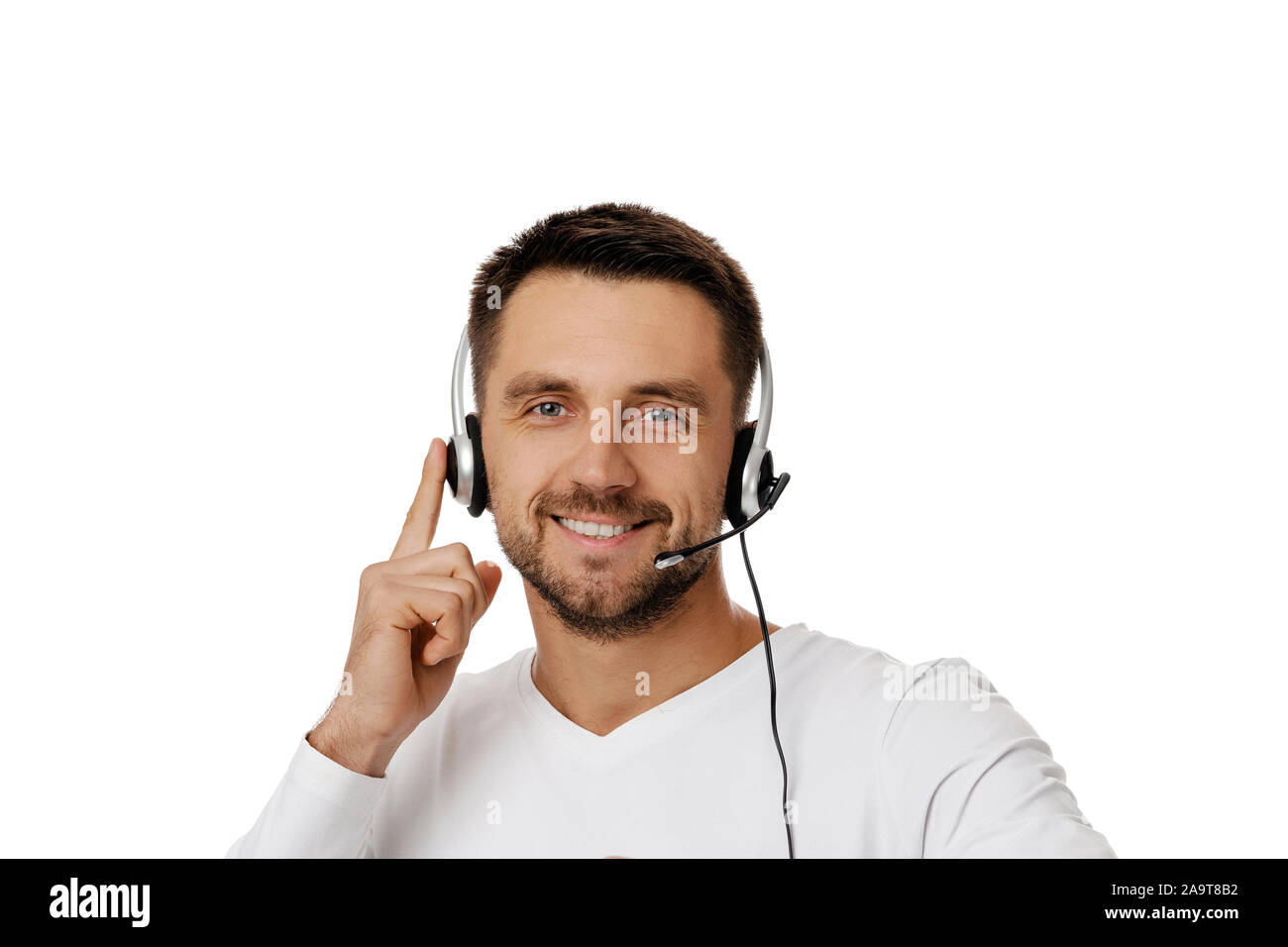 Call center worker man isolated on white background. Smiling friendly ... Call center worker man isolated on white background. Smiling friendly ...