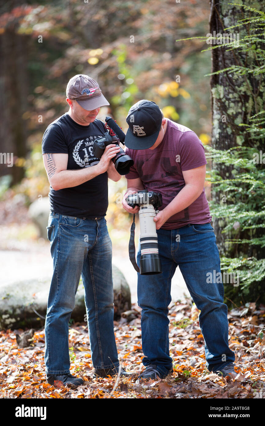 Oliver Hellowell Photographer with Down Syndrome being filmed while in ...