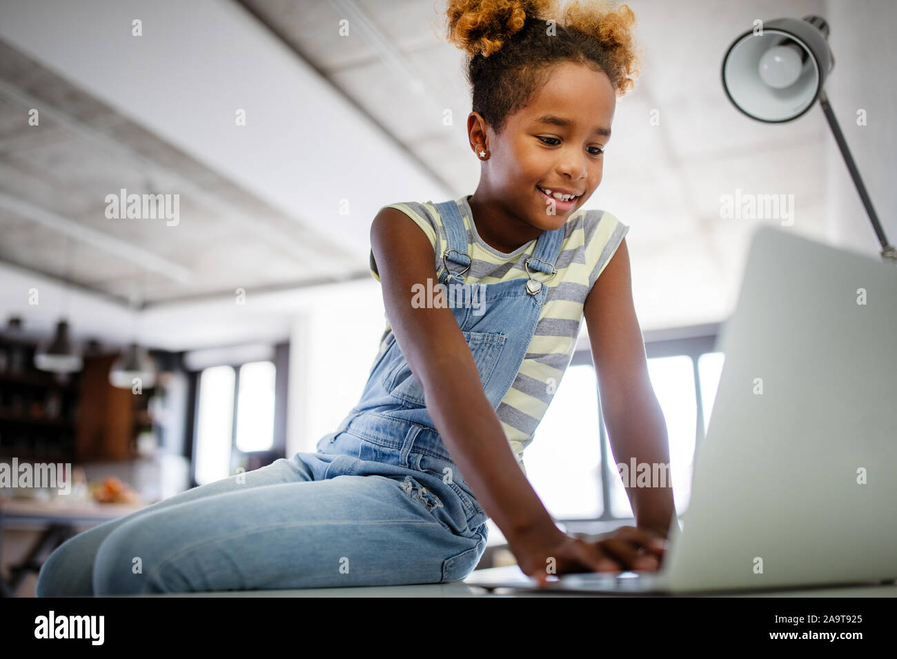 Game, study, fun concept. Happy children spending time with notebook ...