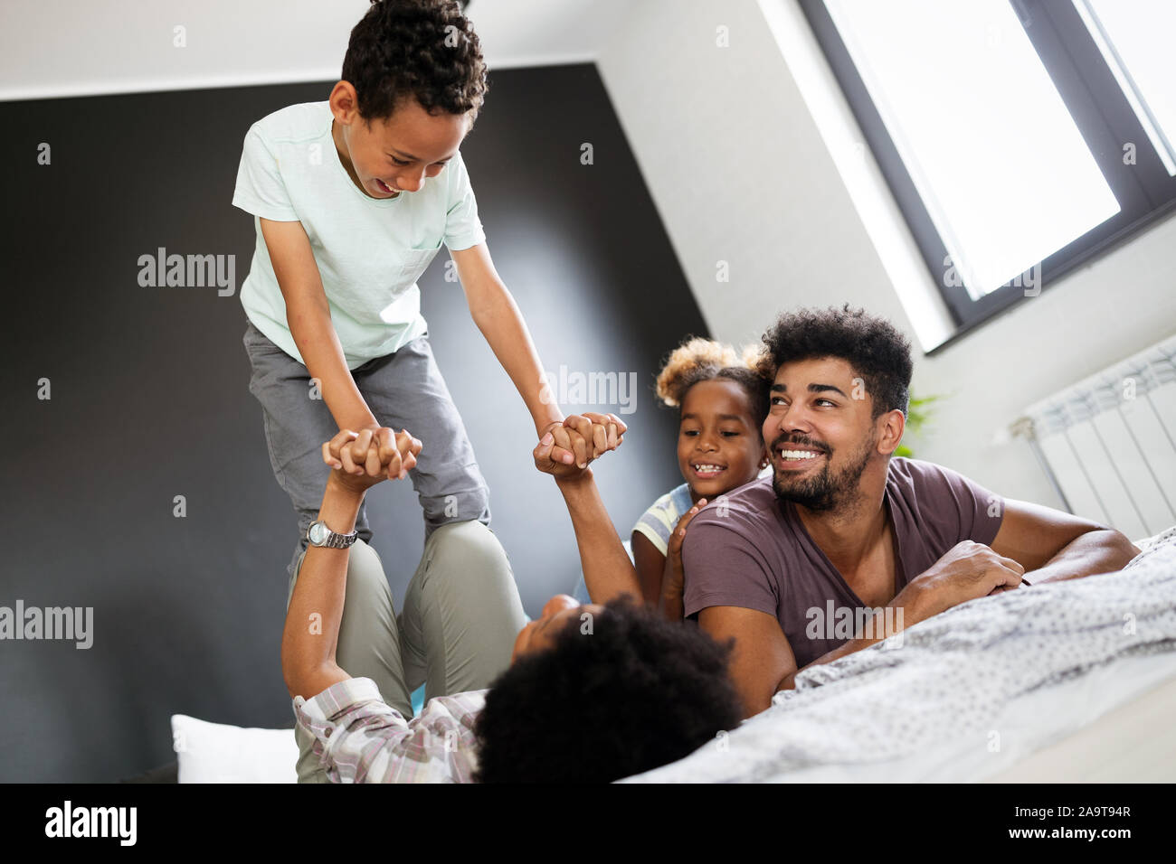 Happy black family having fun times at home Stock Photo - Alamy