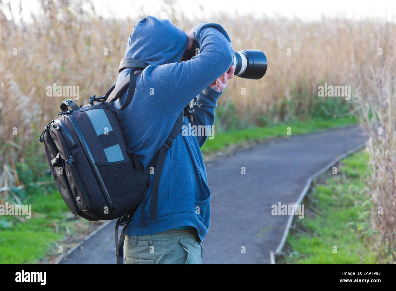 Oliver Hellowell Photographer with Down Syndrome out and about creating ...