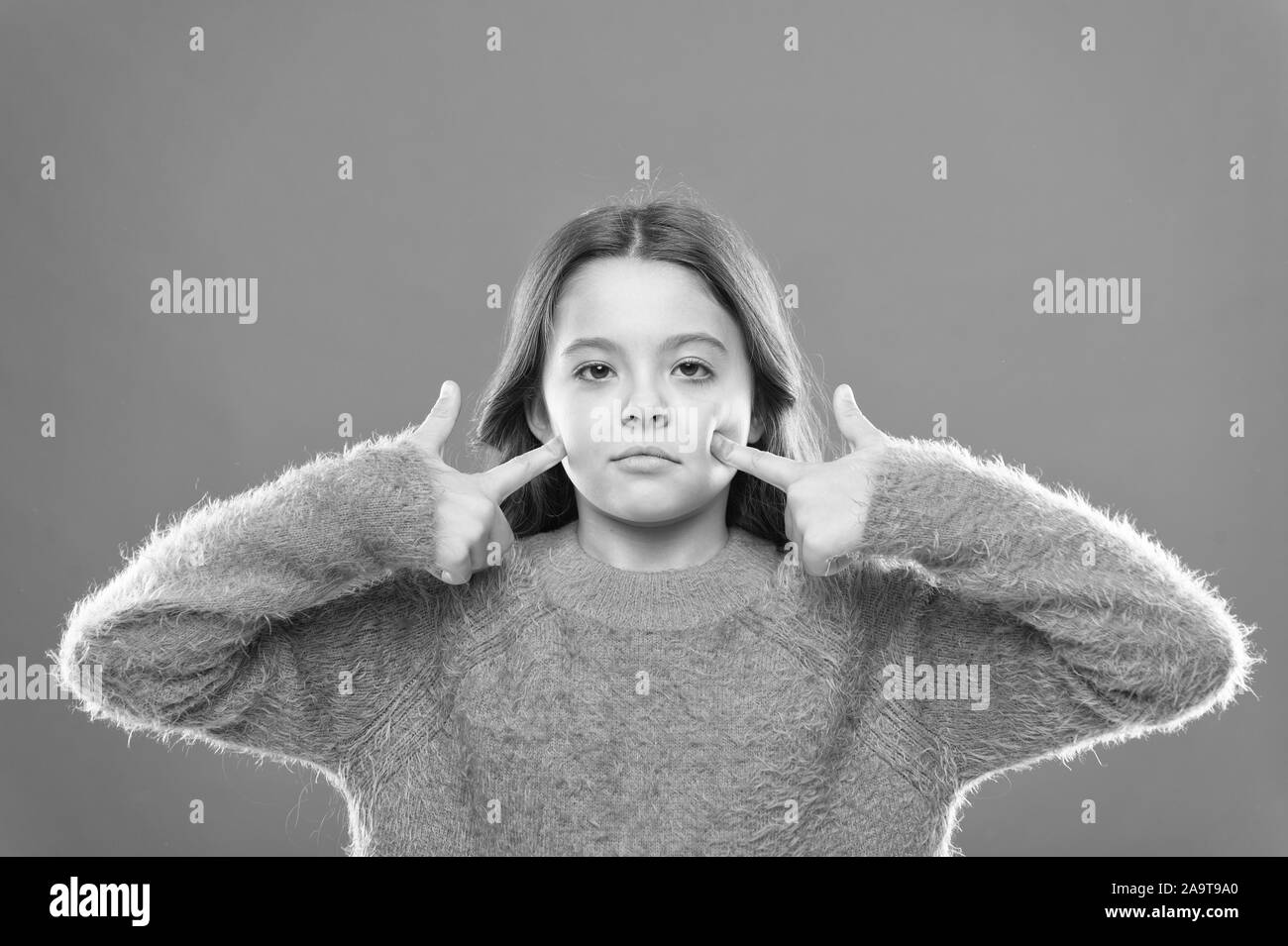 Face building exercises. Forever young. Girl cute kid elastic skin show ...