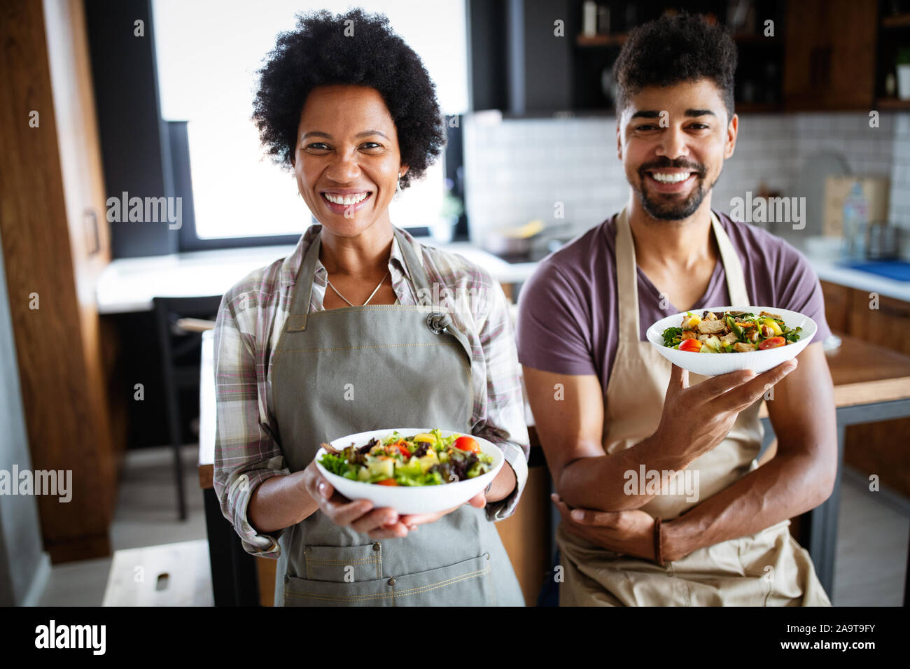 Portrait of happy chefs in kitchen. Healthy food, cooking, people ...