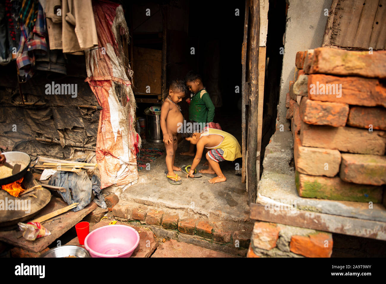 Children playing in the garbage dumps Stock Photo - Alamy