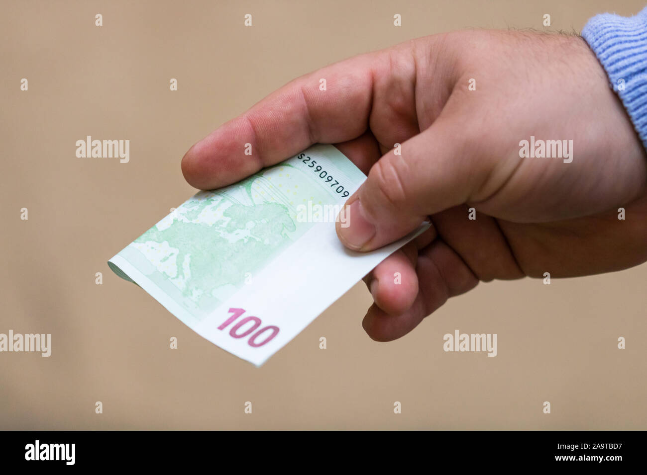 Businesswoman giving euro banknotes hi-res stock photography and images ...