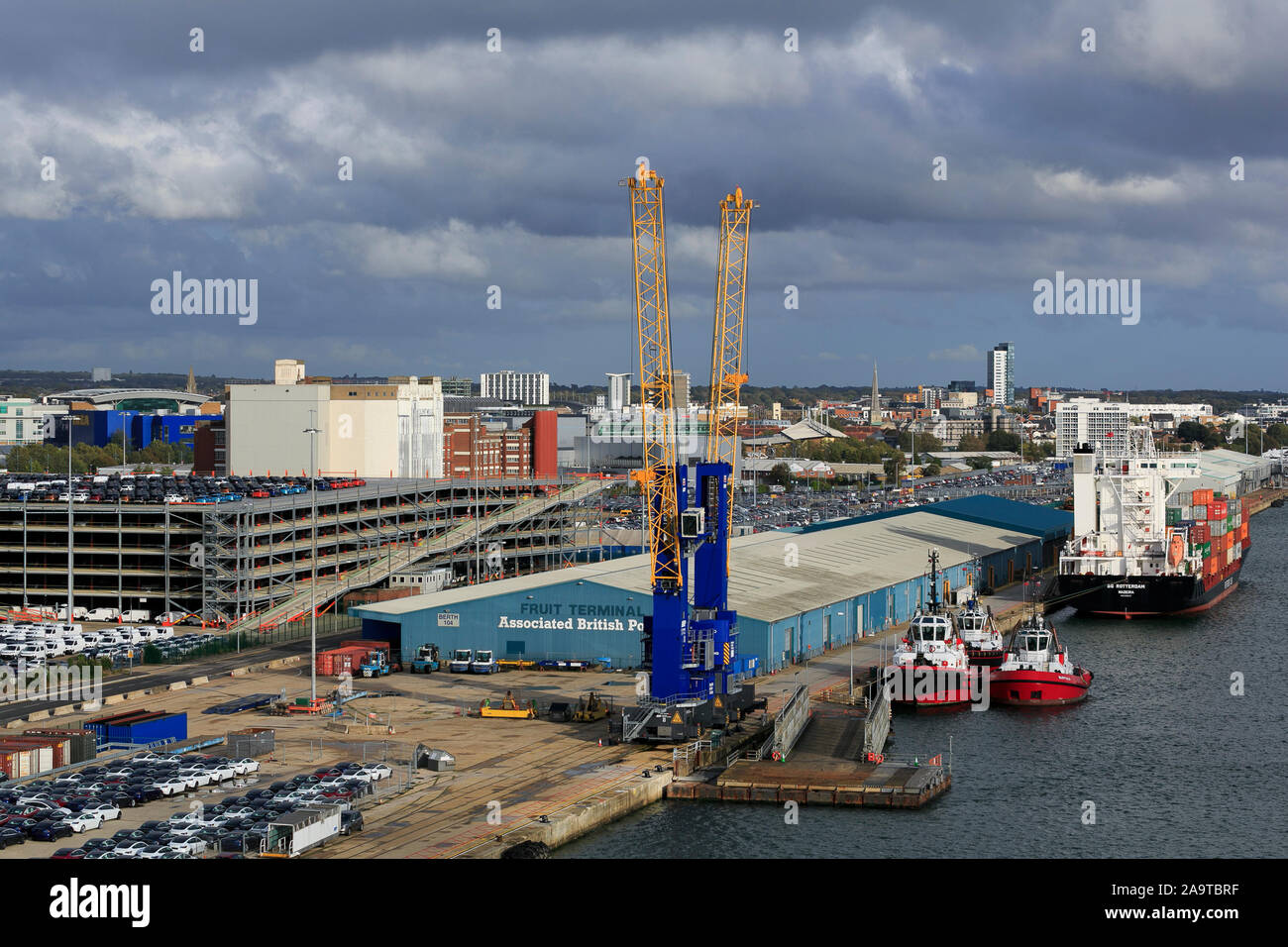 Container ship & tugboats, Port of Southampton, Hampshire, England ...